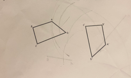 Find the center of rotation that maps the first figure onto the second ...